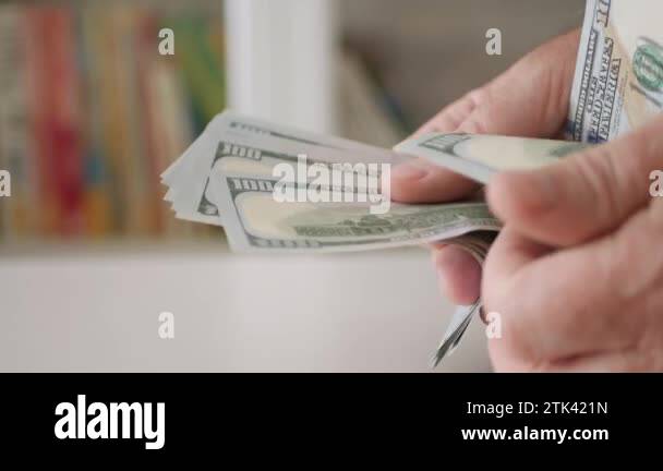 Blurred Shooting with a Man Counting Cash Money, Calculating Salary ...