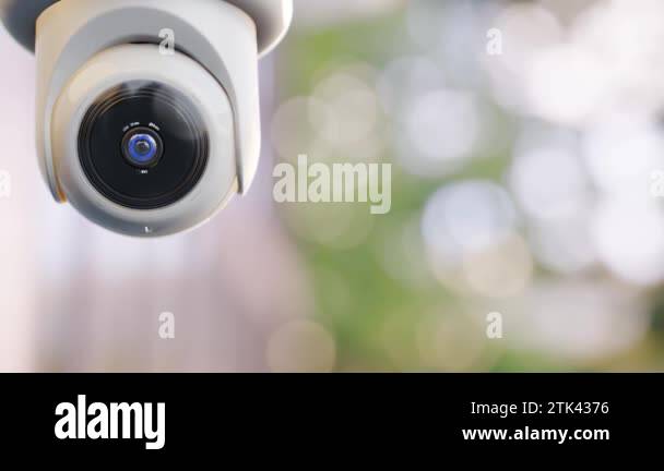 CCTV camera security installed on wall of the building. Scan the area ...