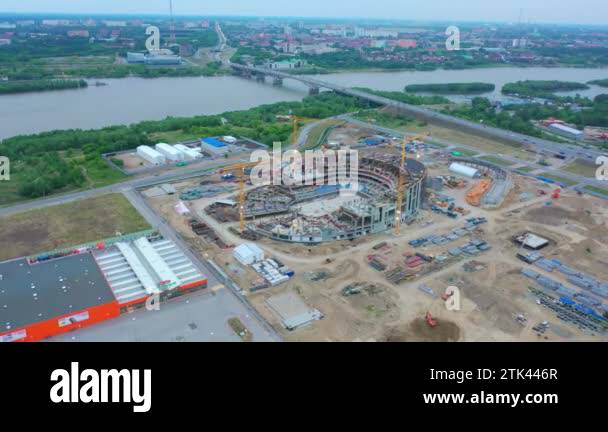 Construction site of future sports arena near shopping mall on ...