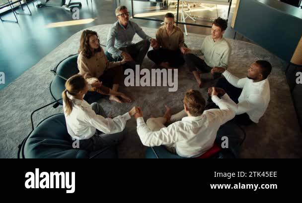 Hold hands sit group Stock Videos & Footage - HD and 4K Video Clips - Alamy