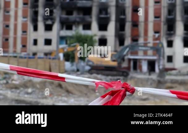 Demolition of a high-rise building. House collapse. Construction work ...