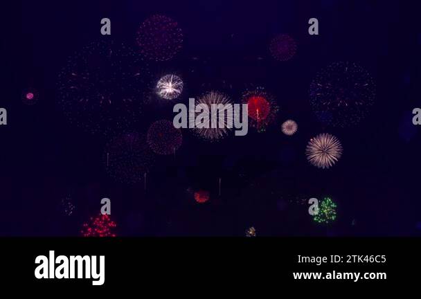 Colourful shining fireworks with bokeh lights fireworks are glowing in ...