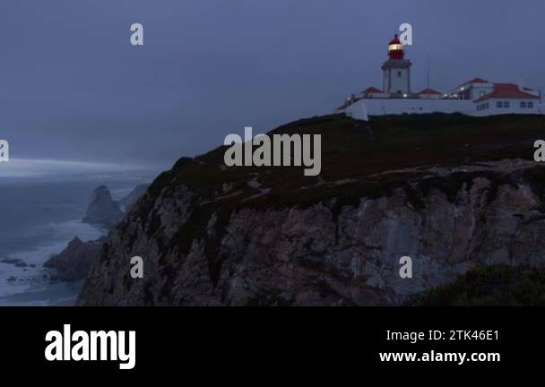 Beautiful dark evening panorama with farol lighthouse in the Atlantic ...
