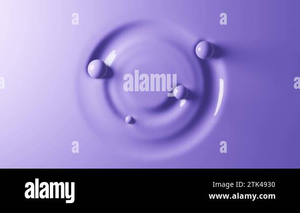 Four balls roll in a circle on a soft surface. Top view of spheres in ...