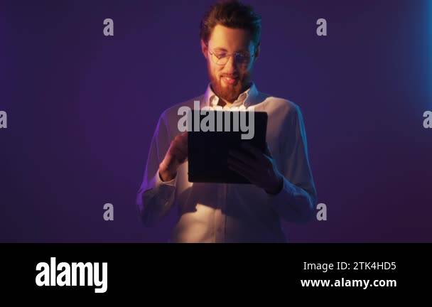 Network searching. Happy man. Neon light portrait. Smiling smart casual ...