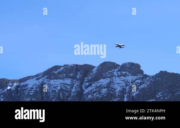 Flying fighter jet fires real bullets with cannon at a target on a ...