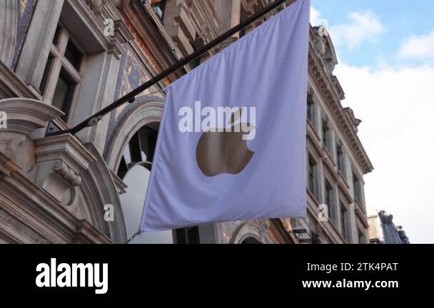 Apple logo on white flag flying outside their flagship store in Regents ...