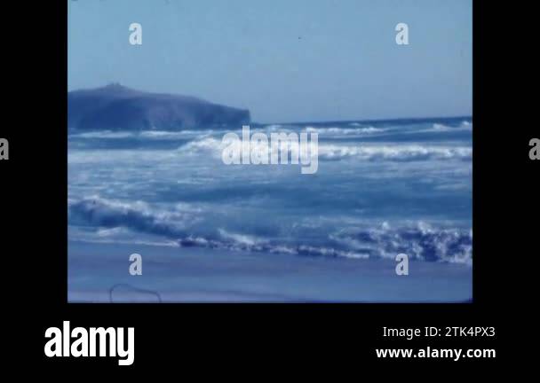 Palinuro, Italy june 1970: Waves of the rough sea crashing on the beach ...