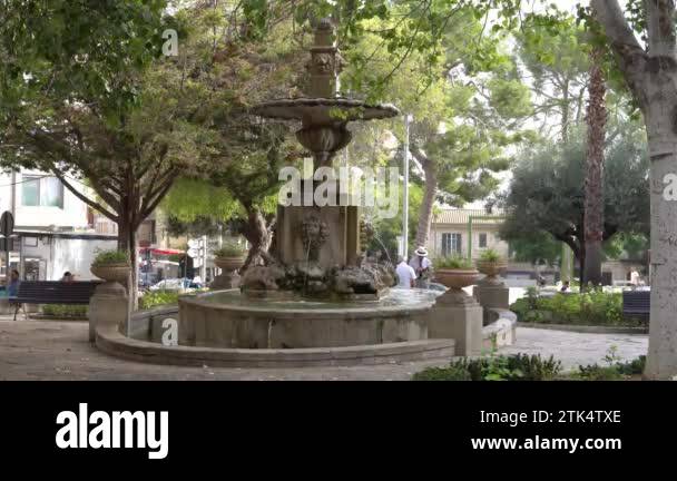 Fountain in the Majorcan city of Inca, with reliefs of lion faces ...