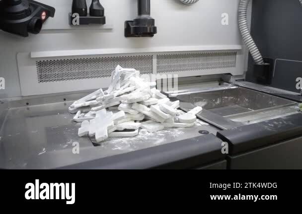 Objects and models printed on industrial 3D printer from white plastic ...