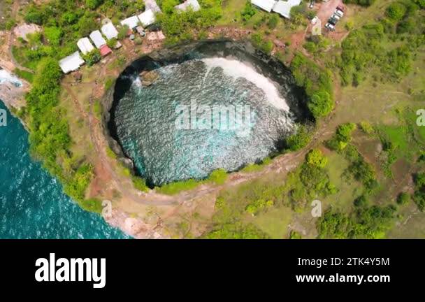 Tourist must visit Broken beach in Bali Island Indonesia. Aerial view ...