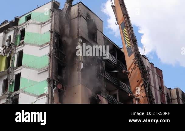 The destruction of a multi-storey building after being hit by an ...