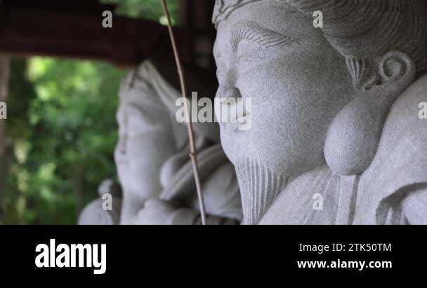 Japanese guardian statues at the traditional street in Tokyo. High ...