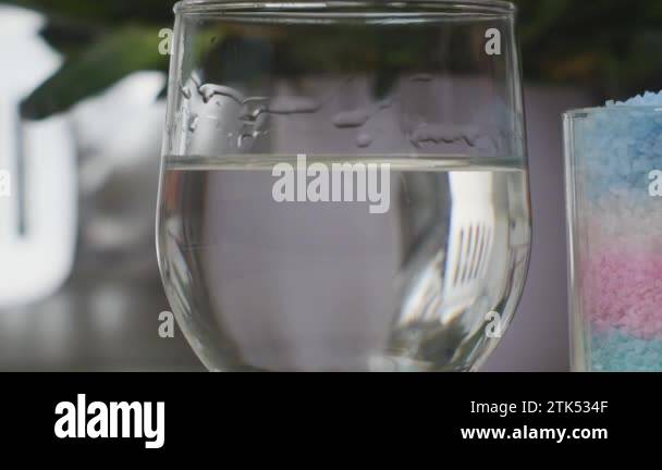 Salt water glass experiment Stock Videos & Footage - HD and 4K Video ...