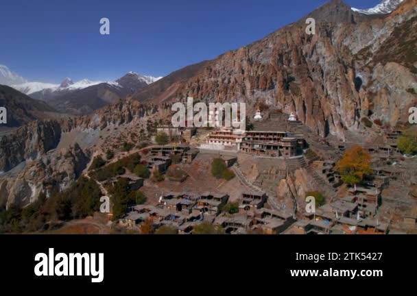 Aerial panning view bhrala village house settlement. Annapurna circuit ...