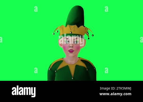 New Year's party clown elf in green and yellow dress talking on green ...