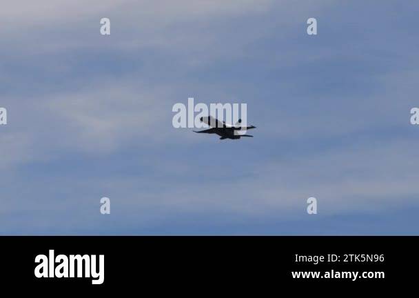 Military fighter jet plane fires bullets with cannon and turn right ...