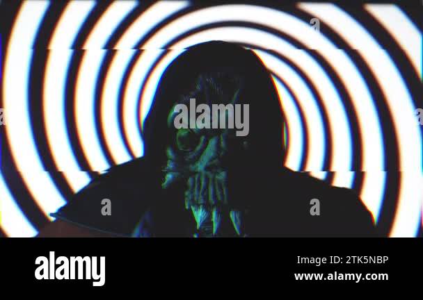 Creepy man with demon mask against Monochromatic Rotating Spiral ...