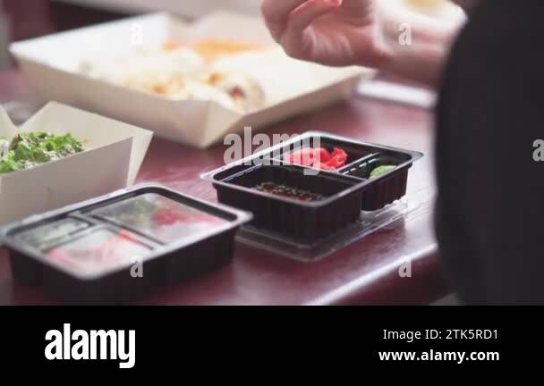 Joint meetings of friends over Japanese dishes. People eating Japanese ...