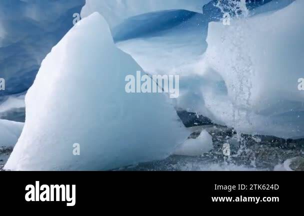 Blue white ice of glacier inside of ice cave. Glacier melting down and ...