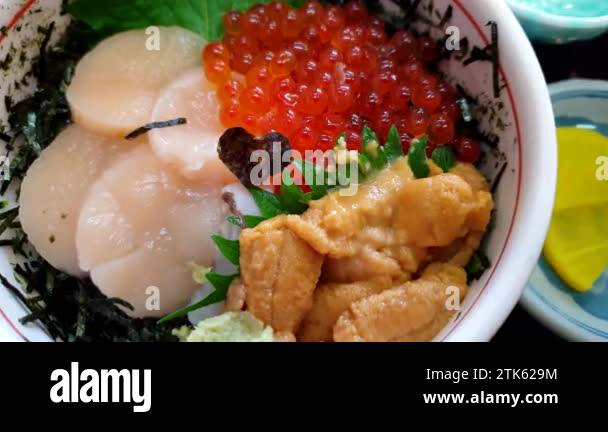 Hakkaido raw seafood rice topping scallop sea urchin and salmon roe ...