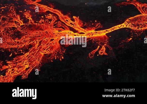 Volcano eruption in 2023, Red burning lava erupts from the ground in ...