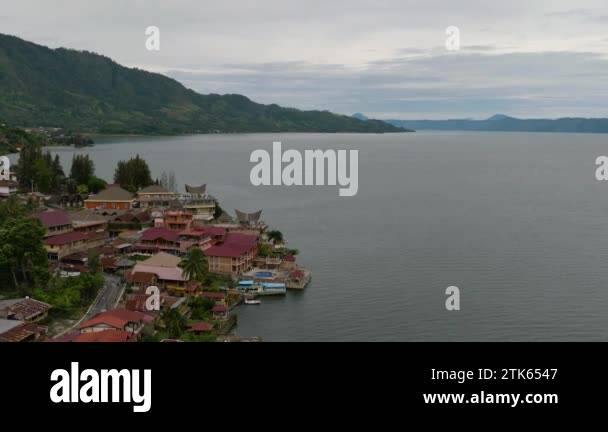 Town known as Tuk-Tuk, located in Samosir Island, Danau Toba Indonesia ...
