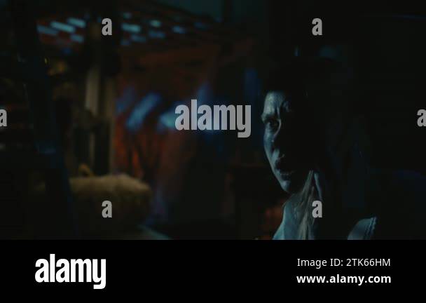 Horror movie scene. Focus on female face. Scared girl victim of the ...