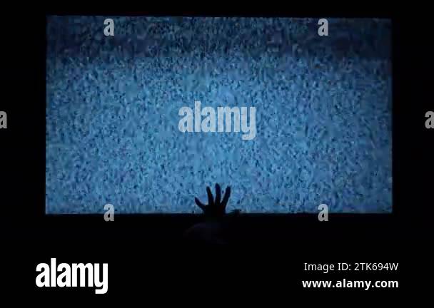 Hands on the background of the noise of the TV scary scene for a horror ...