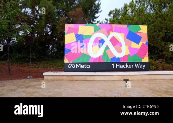 Multi colored advertisement billboard displaying logo of Meta and 1 ...