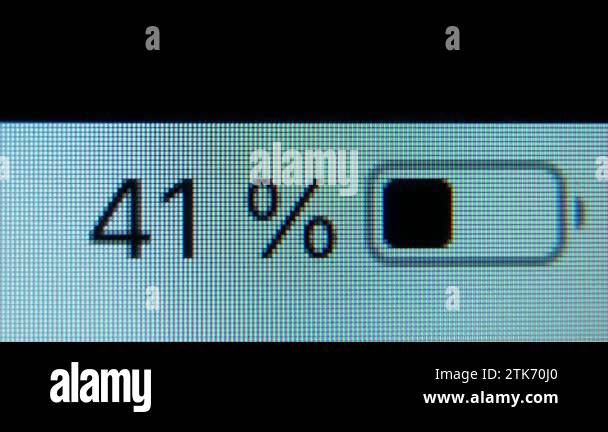Connecting the phone to the charger. Smartphone battery level indicator ...