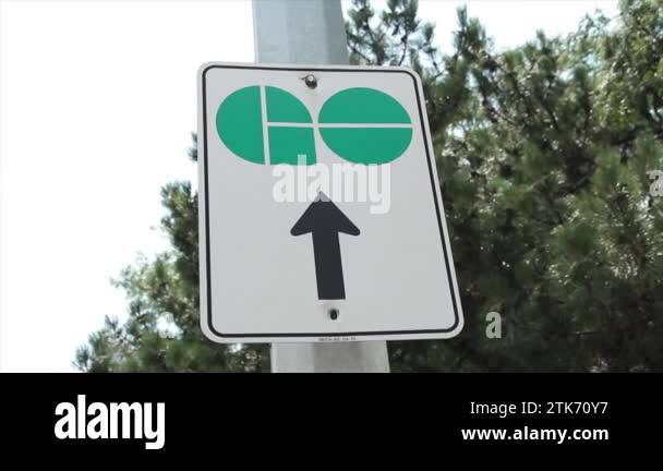 go train vertical rectangle sign logo blowing in wind from bottom with ...