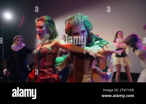 Passionate dance of actor and actress in elegant retro-style costumes ...