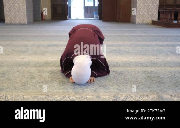 Asian Girl Making Prostration, muslim girl prostrating, praying in ...