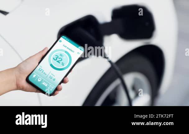 Smartphone display battery status on smart EV mobile application while ...