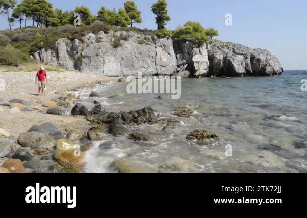Beach comber Stock Videos & Footage - HD and 4K Video Clips - Alamy