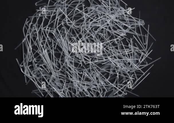 Straws made of plastic for drinking. Disposable plastic spinning on the ...