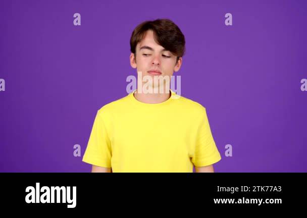 Teenager boy smelling armpit with nasty face. Bad smell and adolescence ...