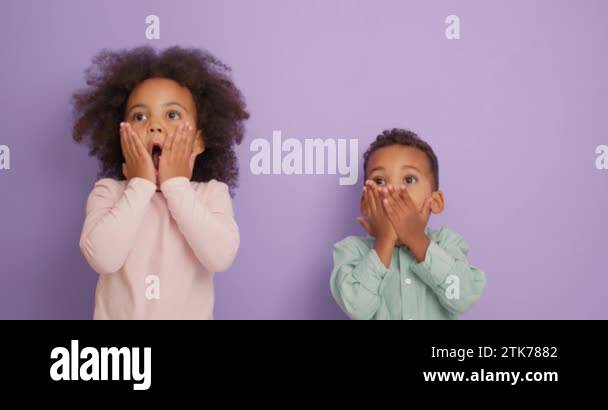 cute adorable African American children expressing surprise, shock, wow ...