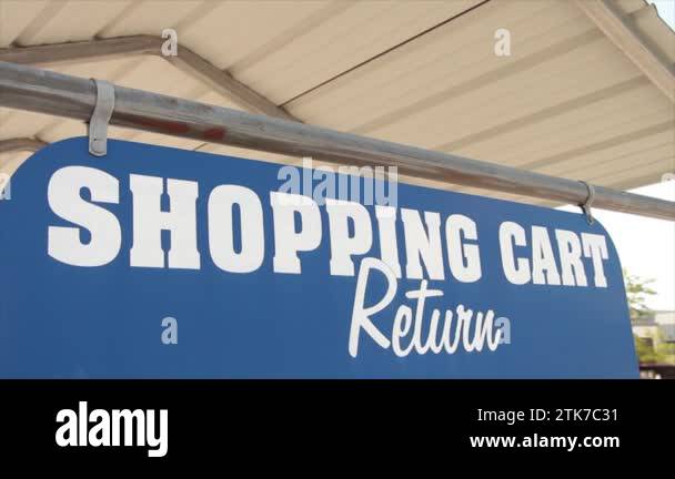 shopping car return writing caption text sign outside outdoors in ...