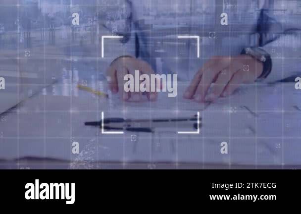 Animation of scope scanning over mid section of male engineer using compass to design a plan ...