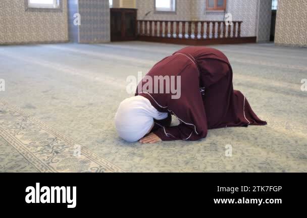 Worship In The Mosque, muslim girl prostrating, praying in islam, young ...