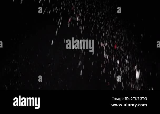 Stream of Falling Confetti, Dust Particles, and Snowfall on Black ...
