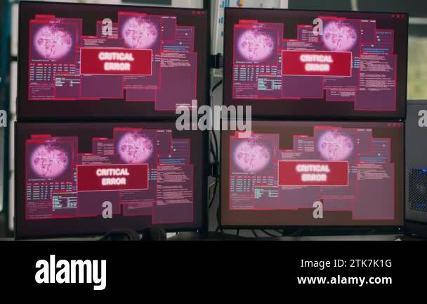 Computers displaying critical error message flashing on screen, showing ... Computers displaying critical error message flashing on screen, showing ...
