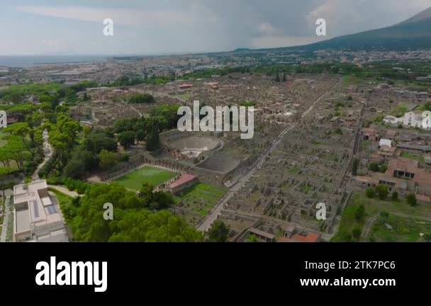 Aerial descending footage of large historic site of ancient city ...
