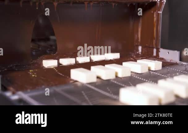 White chocolate coating Stock Videos & Footage - HD and 4K Video Clips ...
