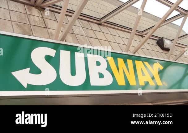 subway sandwiches franchise business sign logo in front of subway ...