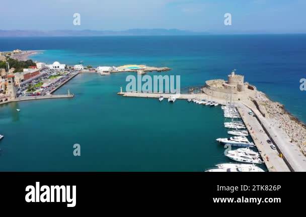Mandraki port with deers statue, where The Colossus was standing and ...