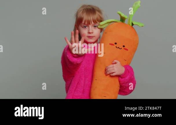 Young preteen child girl kid say No hold palm folded crossed hands in ...