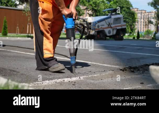 Jackhammer breaking rock Stock Videos & Footage - HD and 4K Video Clips ...